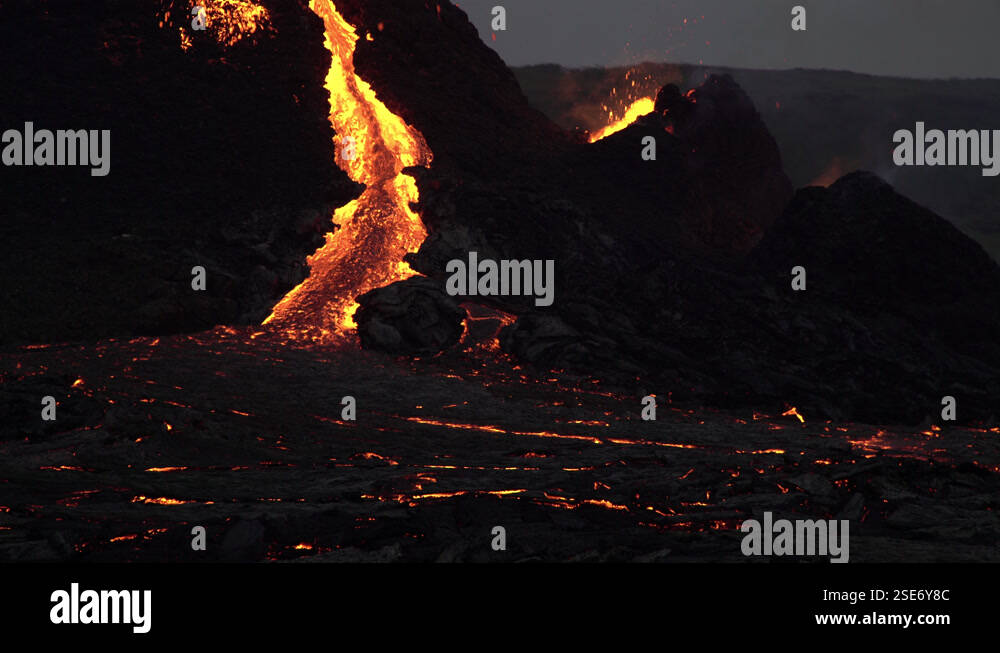 Volcanic eruption Iceland 2021 lava waterfall and river Stock Video ...