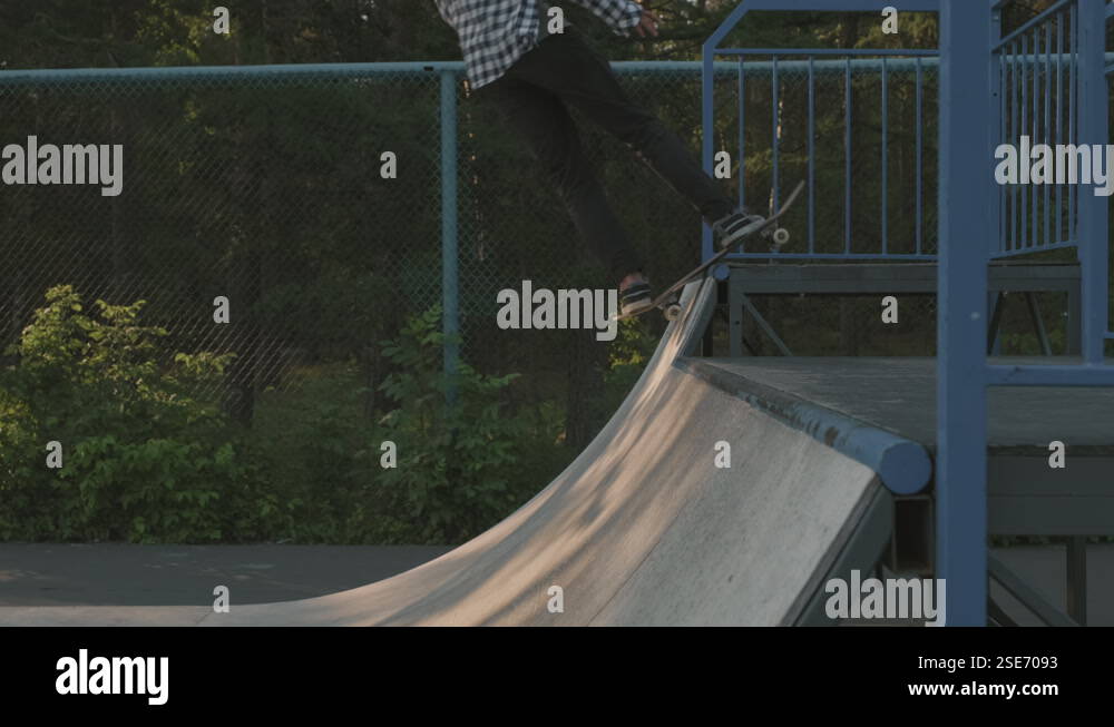 Guys Skating on Half-Pipe Ramp Stock Video Footage - Alamy