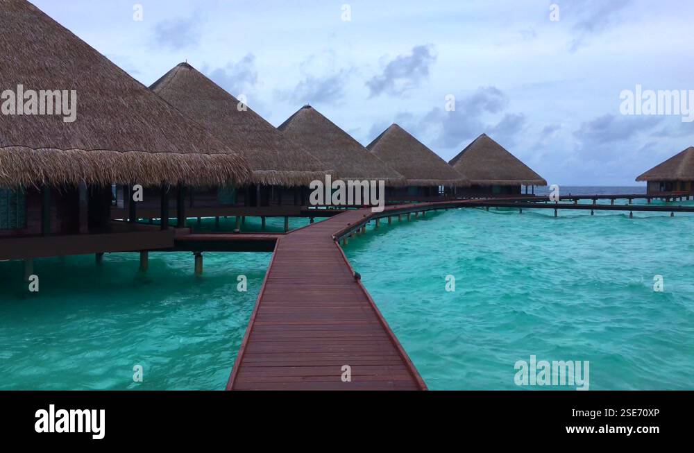 Maldives water Bungalows in 4K - Hear the sound of waves during high ...