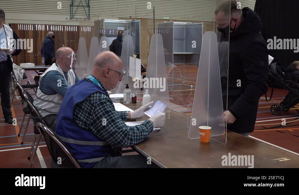 Plastic screens and face masks during national elections in the ...