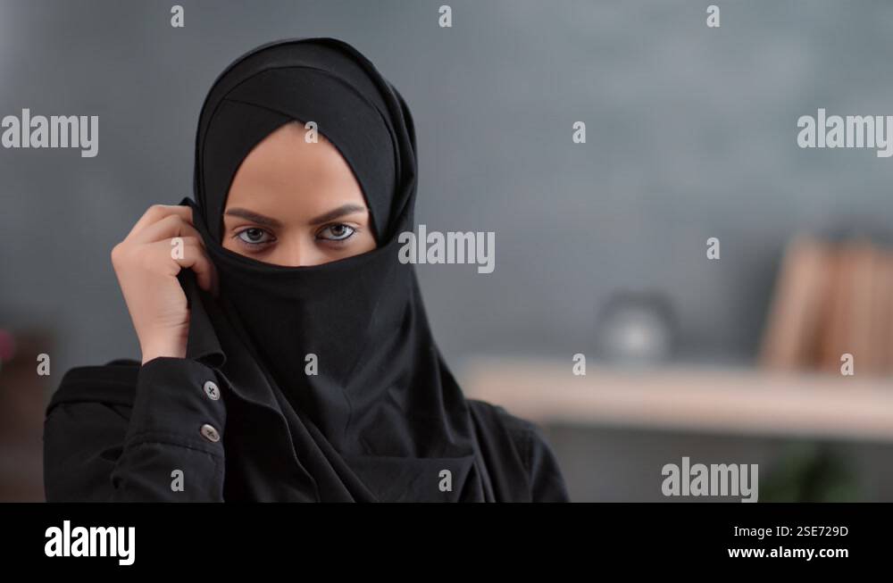 Portrait Arabic woman hidden face under niqab posing at Muslim ...