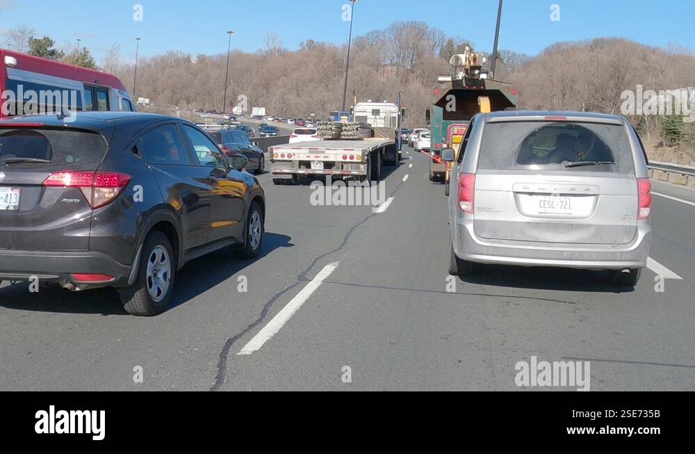POV driving plate slow moving rush hour car traffic on highway Stock ...