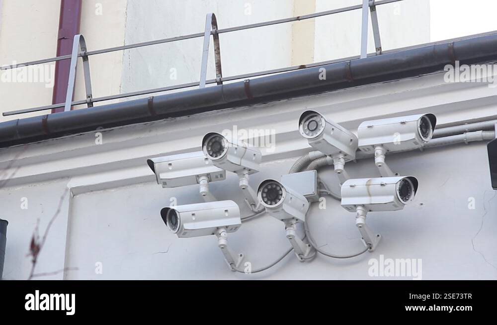 CCTV cameras on the wall of the building. Outdoor video surveillance ...