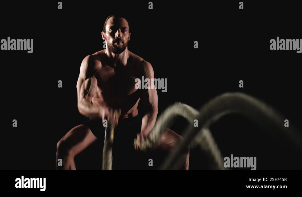 Muscular man training battle ropes Stock Videos & Footage - HD and 4K ...