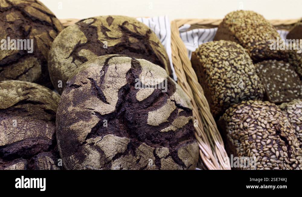 many different types of bread. Wholegrain, round, rolls and loaves ...