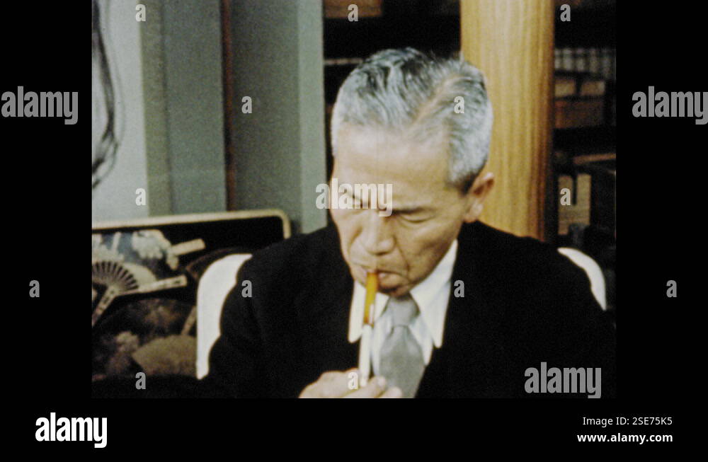1950s: Priest and man talk in office. Man smokes Stock Video Footage ...