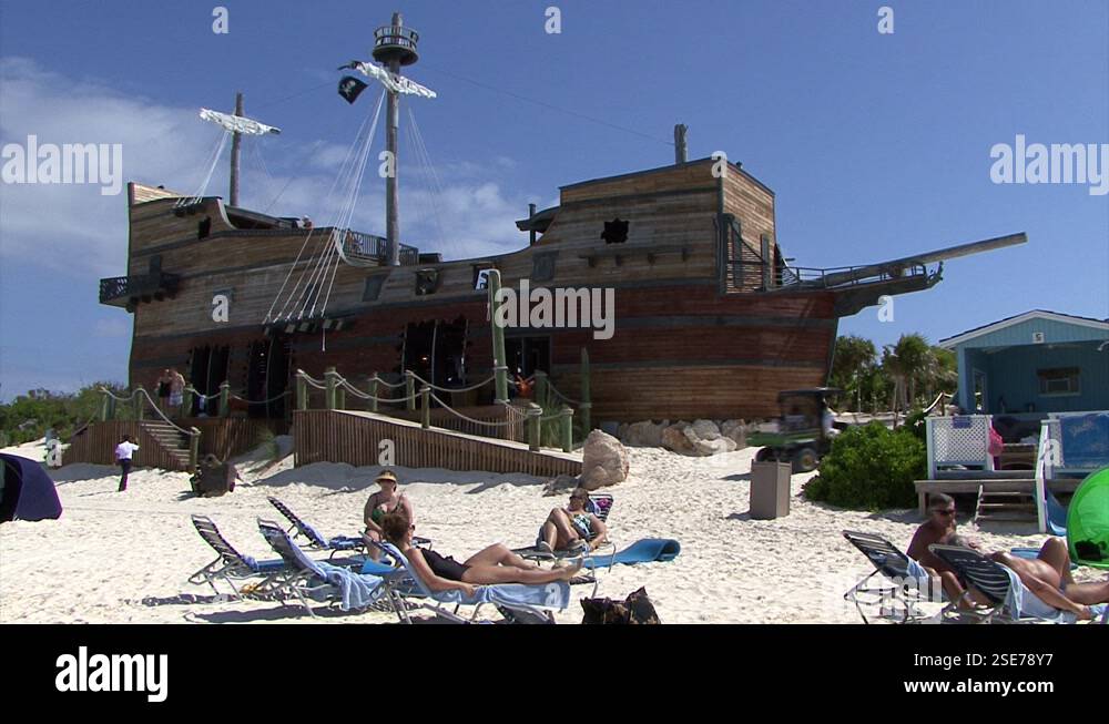 Beach-bar in the shape of a sail ship on the beach of Half Moon Cay ...