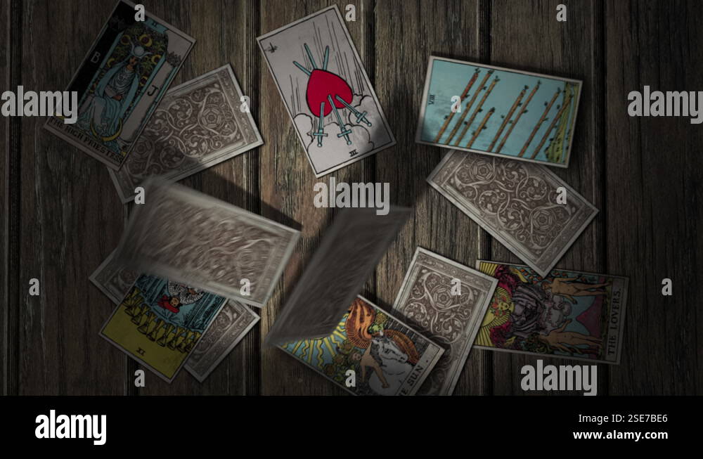 Pack of Tarot Decks falling on a Wooden Table. Medieval Times. Four of ...