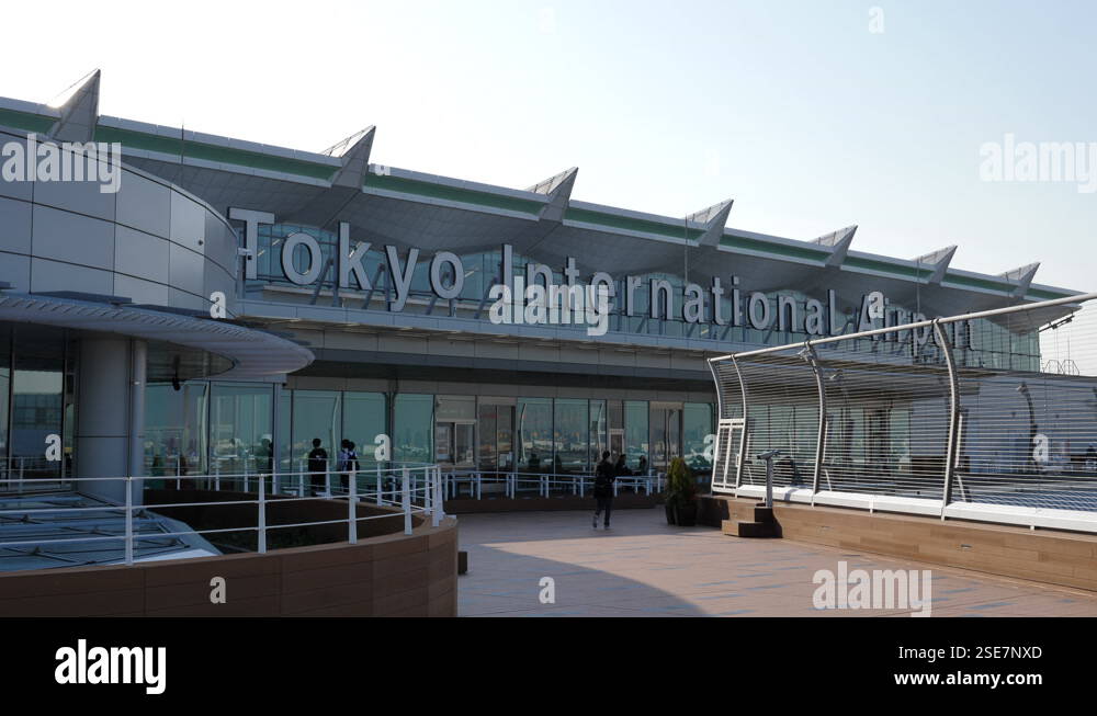 Terminal building entrance and sign Tokyo Haneda International Airport ...