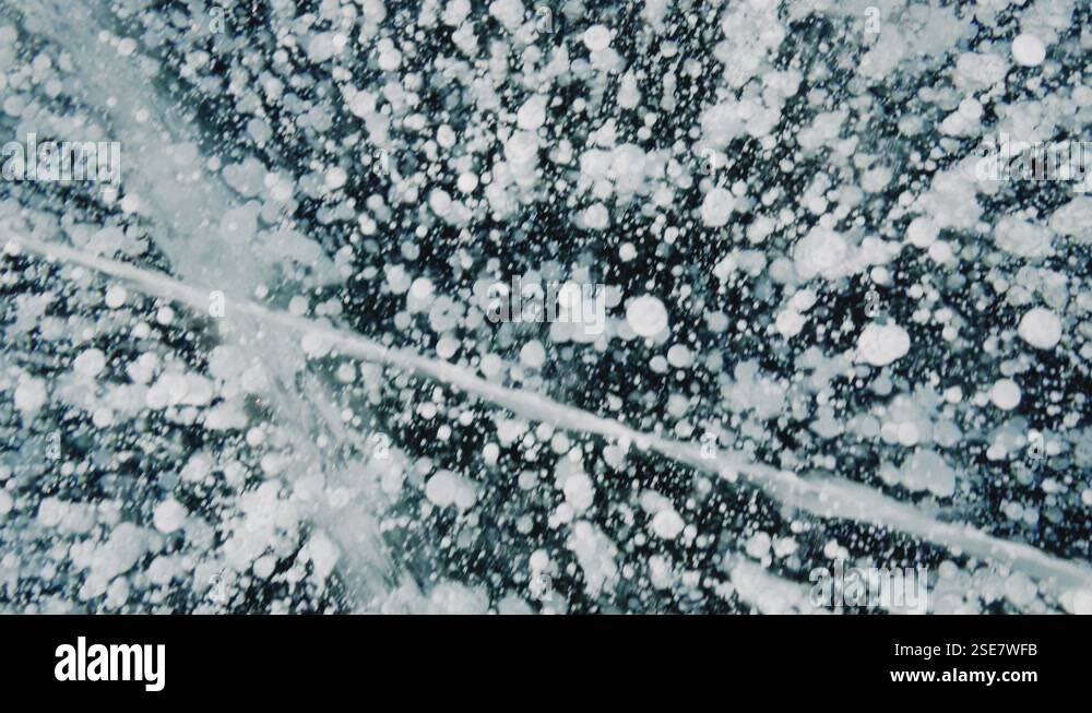 Methane Bubbles in Ice at Baikal Lake in Russia in Winter Stock Video ...