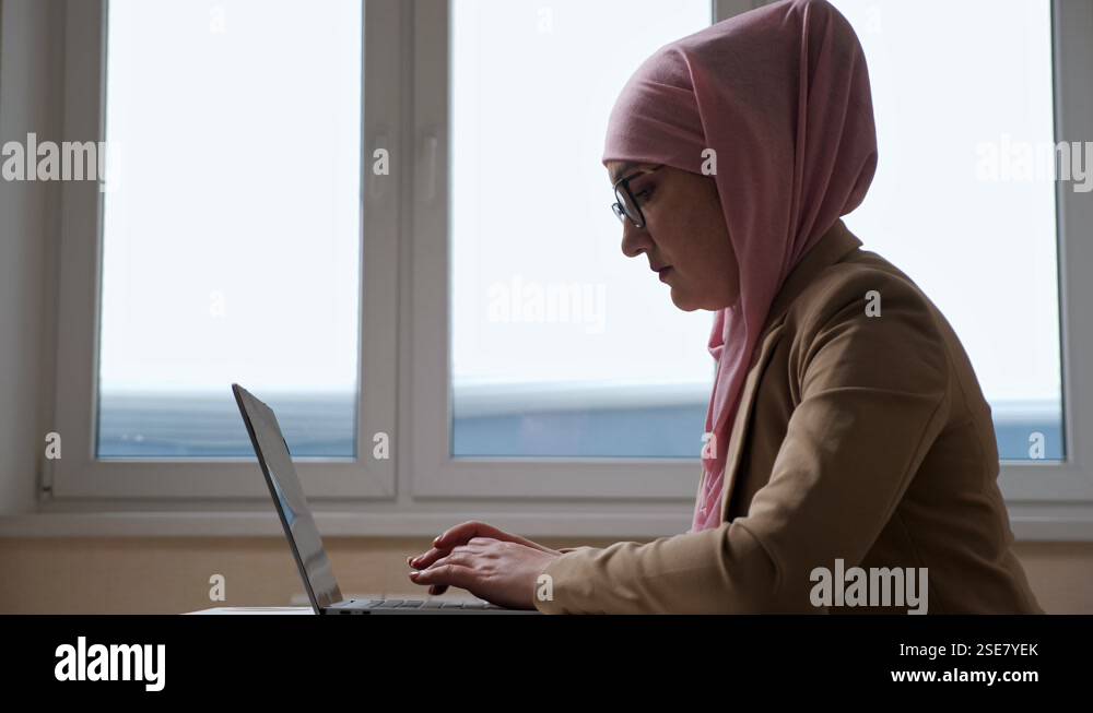 Woman in pink hijab typing Stock Videos & Footage - HD and 4K Video ...