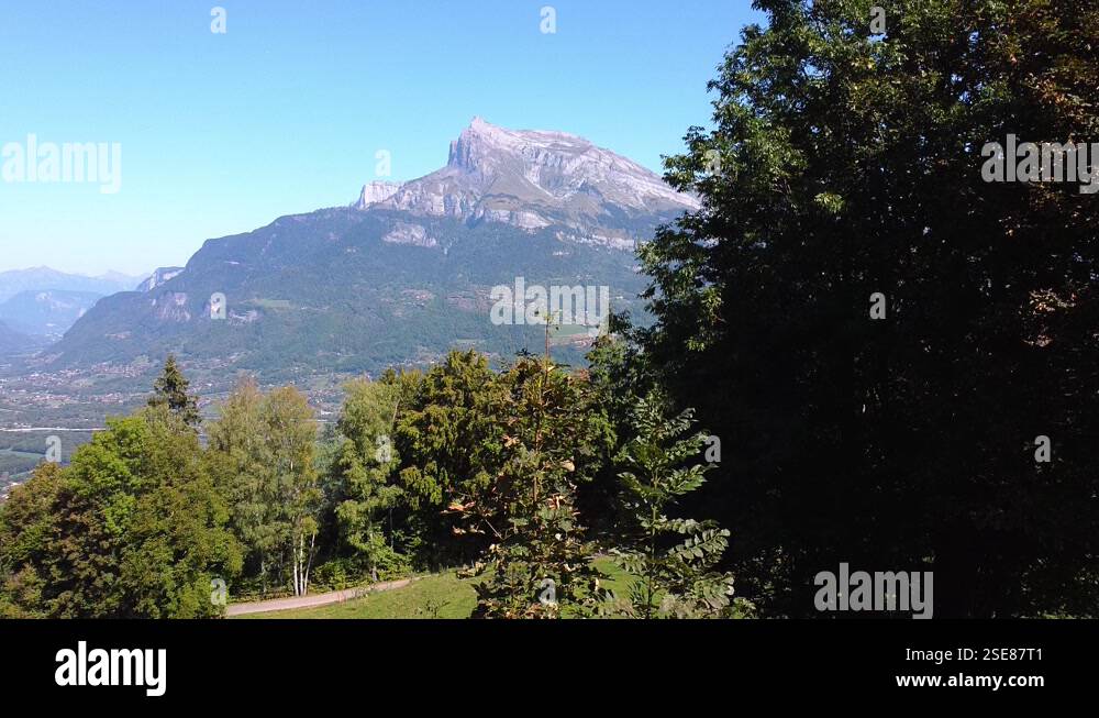 Flying upwards to reveal a valley and mountain range. Arve valley ...