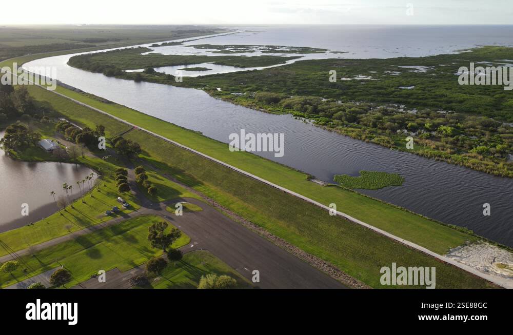 the incredibly green landscape of the water management levee in south ...