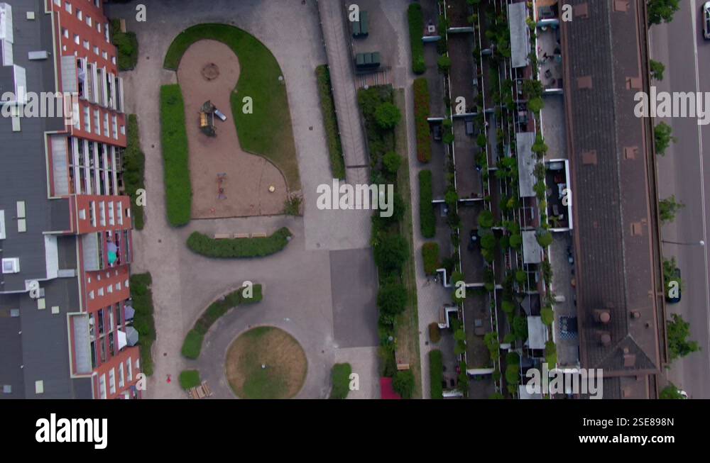 Apartment buildings in streets in top-down aerial view Stock Video ...