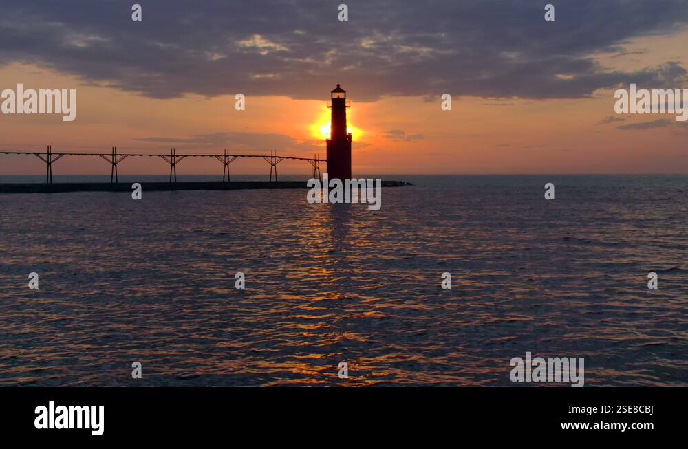 Dramatic twilight with stunning Lighthouse, dawn aerial view with dolly ...