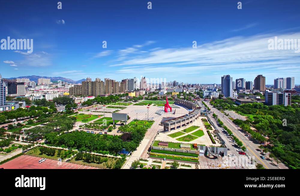 Time-lapse, a high angle view from left to right of a Chinese city ...
