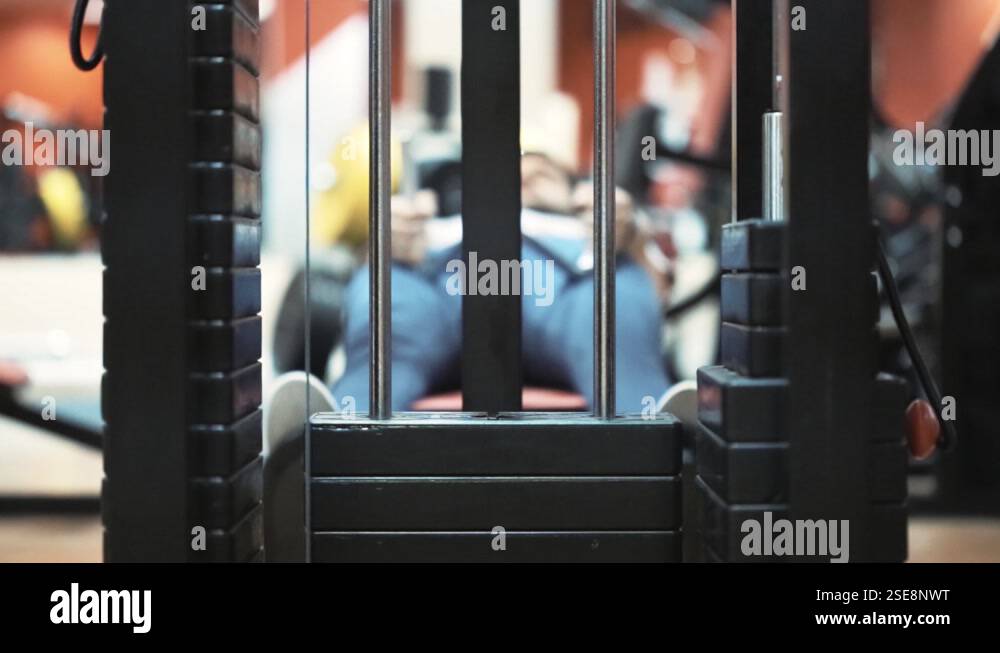 Working mechanism of weight stack in a gym trainer machine Stock Video ...