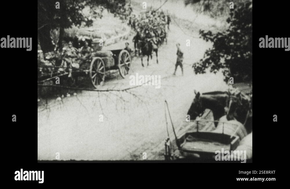 1910s: military car driving by, soldiers in World War 1 marching or ...