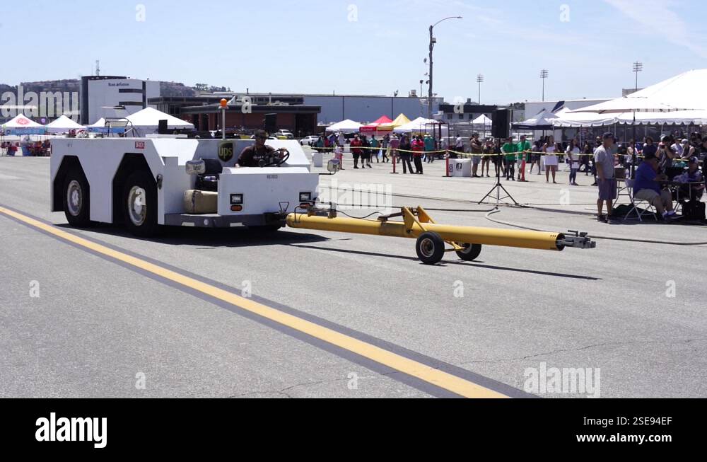 airport tug vehicle on airfield Stock Video Footage - Alamy