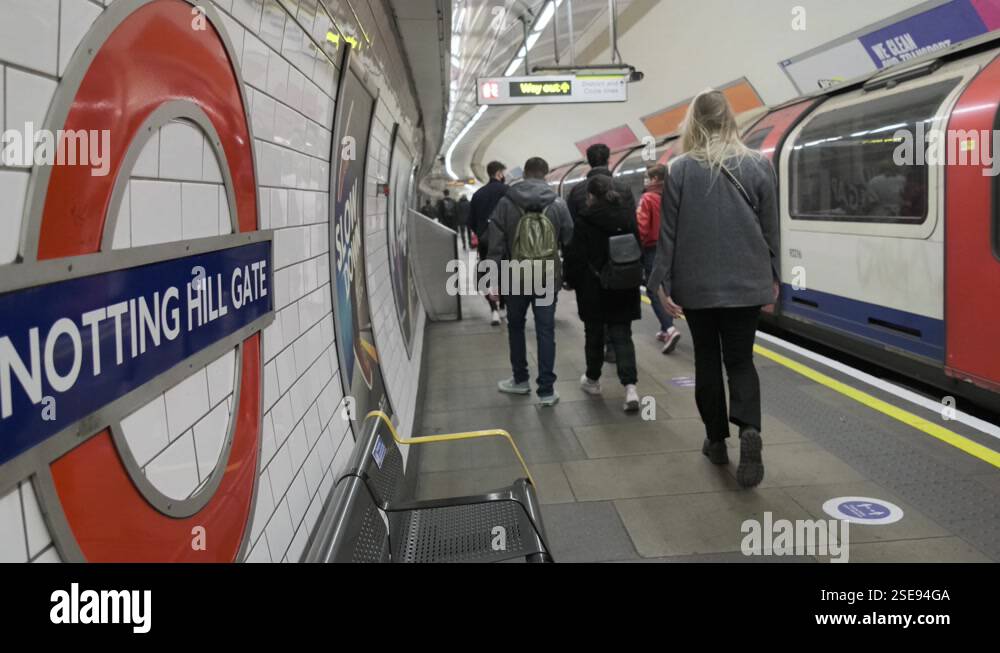 London underground Central Line train leaving Notting hill gate station ...