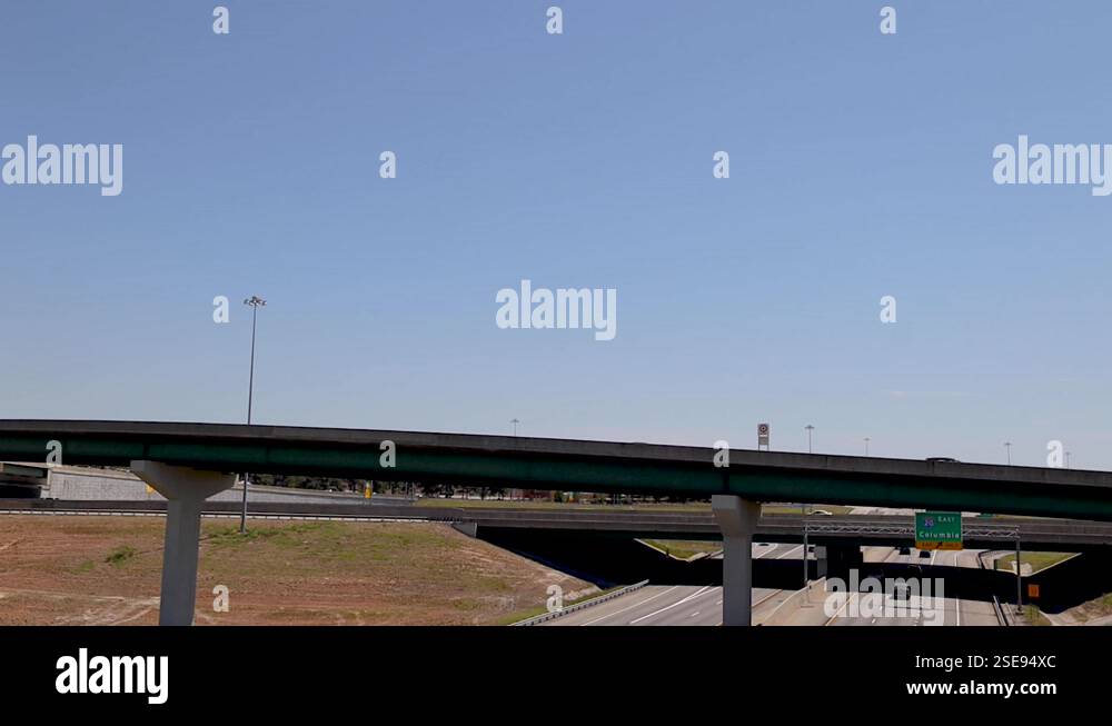 Pan of Traffic multiple bridge view at a major junction with interstate ...