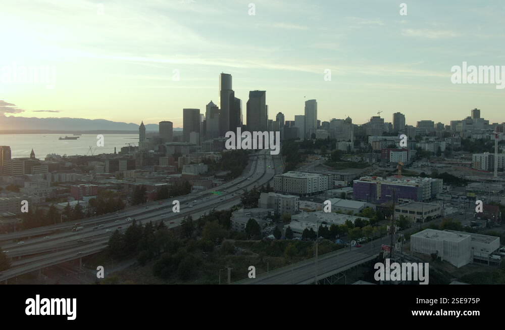 Aerial Panning Shot Of Traffic On Dr Jose P Rizal Bridge By Downtown ...