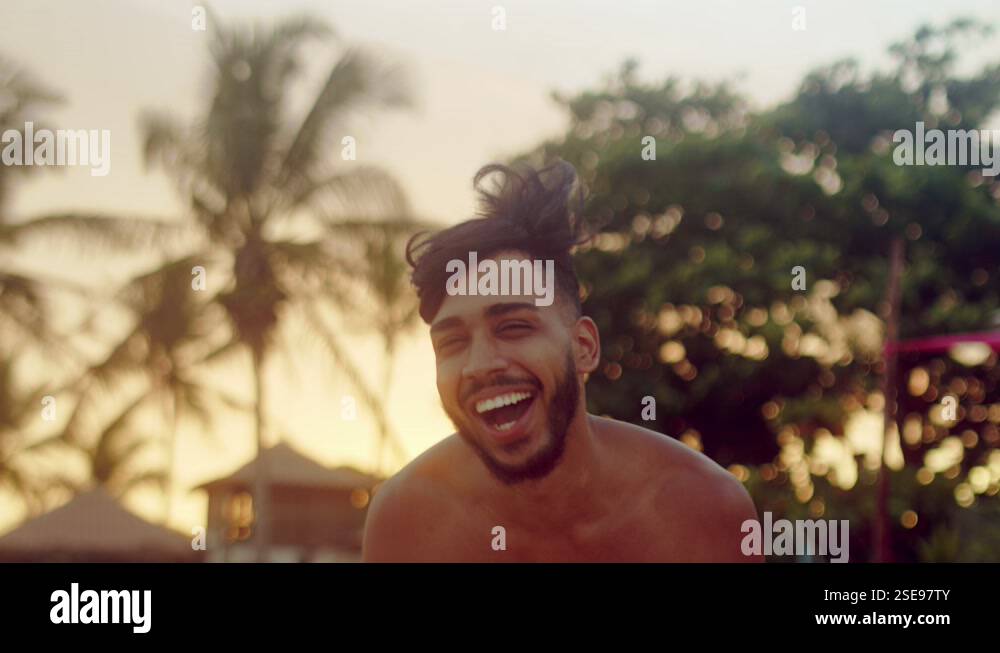 Friendly young Latin American man inviting to come to Brazil, confident ...