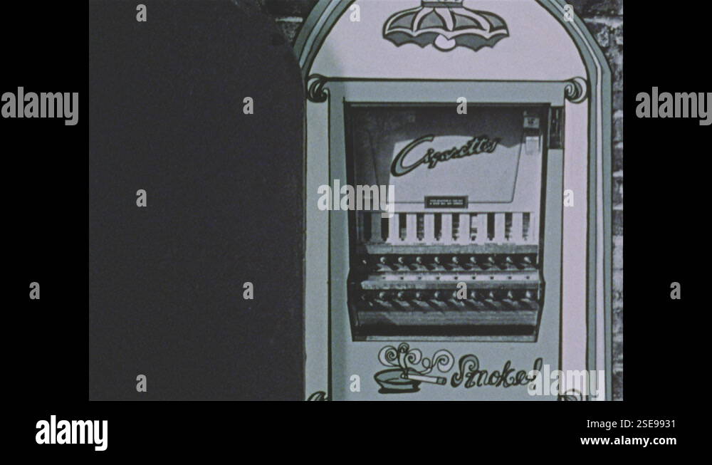 1970s: Cabinet door opens to reveal cigarette vending machine. Cabinet ...