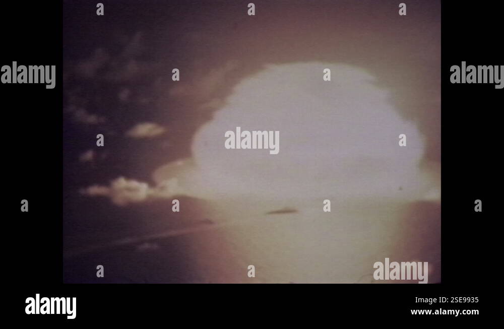 1940s Enewetak Atoll: Nuclear explosion on island, mushroom cloud rises ...