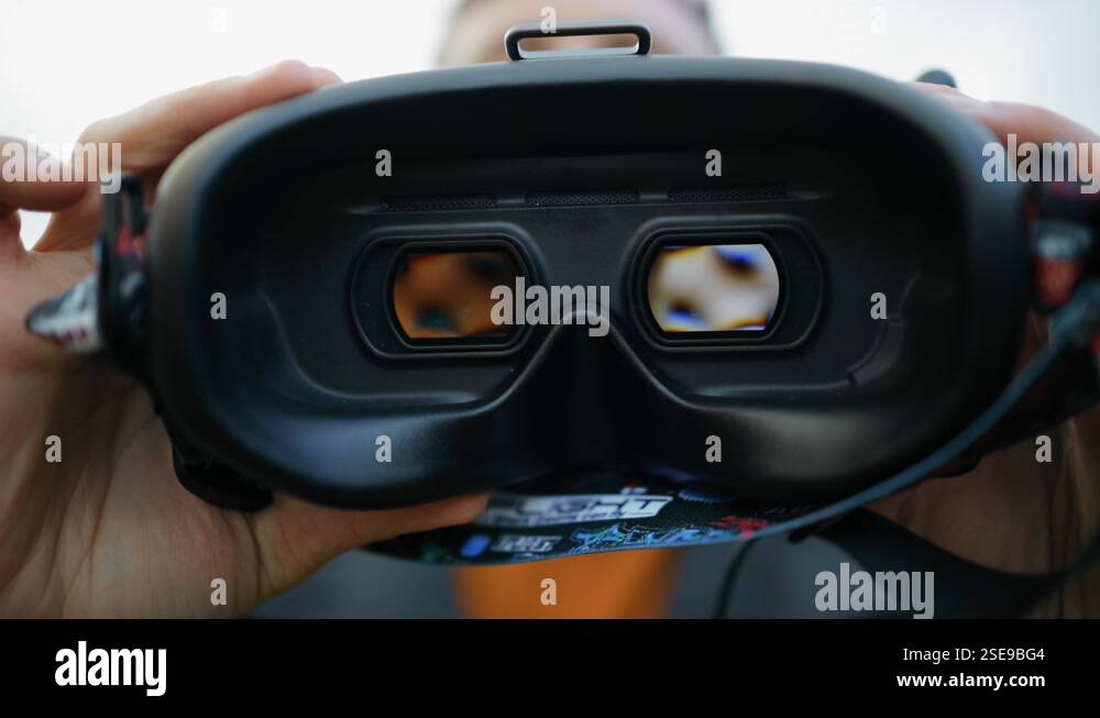 Black FPV goggles move closer to camera with ocular view Stock Video ...