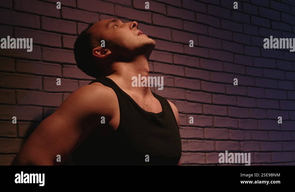 Footage of tired man after training in shadows Stock Video Footage - Alamy