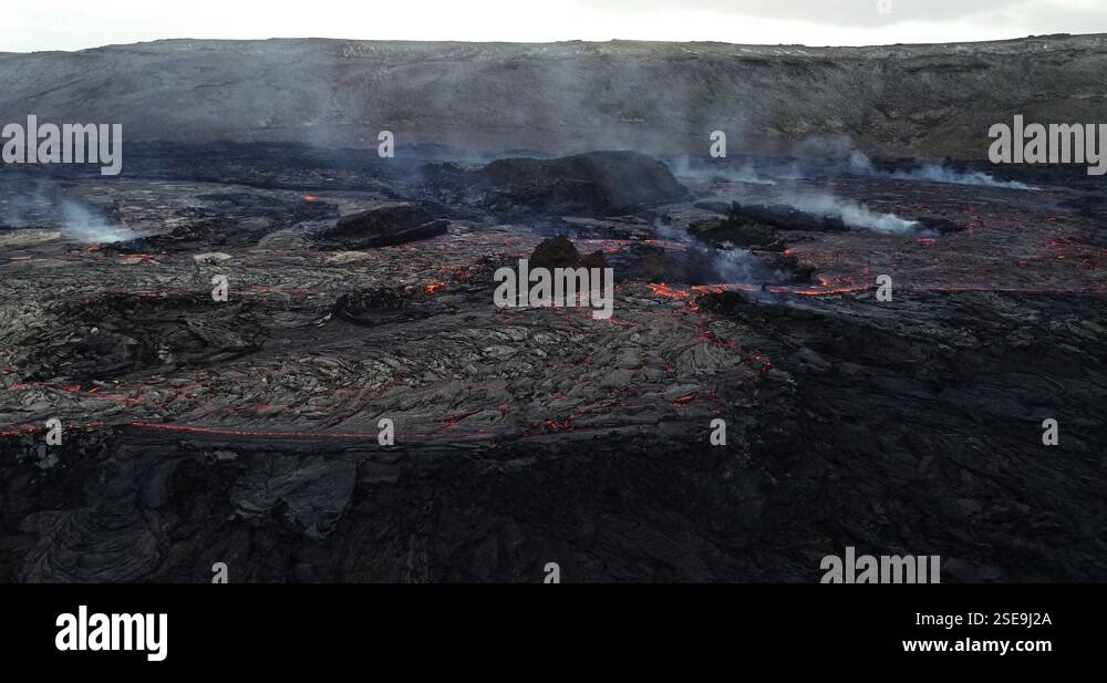 Lava flowing from active volcano from aerial view in 4k Dlog Stock ...