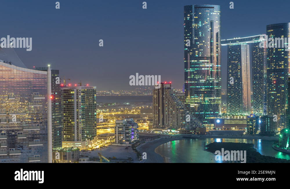 Buildings on Al Reem island in Abu Dhabi day to night timelapse from ...