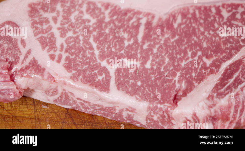 Raw beef steak with fat marbling Stock Videos & Footage - HD and 4K ...