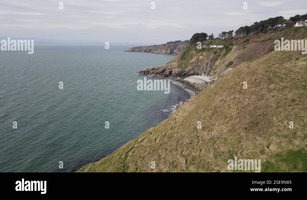Aerial Reveal Of A Tiny Hidden Beach In Howth, Dublin, Ireland With ...