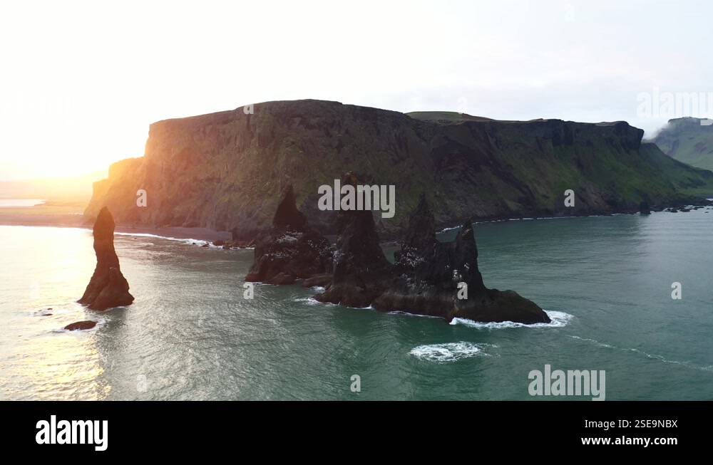 Drone footage of basalt rock formation in Iceland with beautiful sunset ...