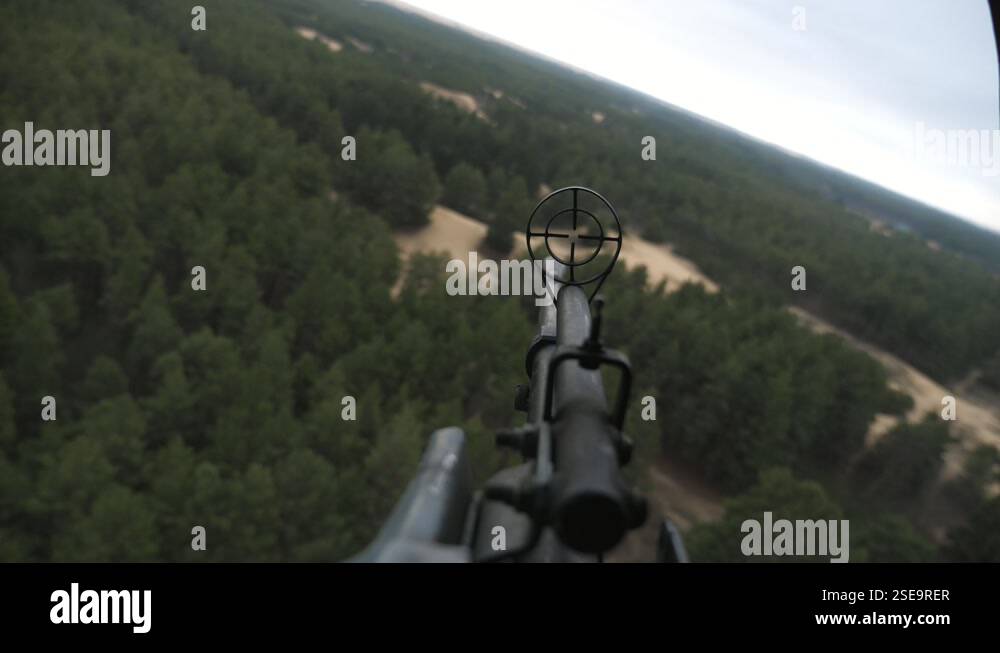 Contemporary machine gun with a big breech-sight fixed in a flying ...