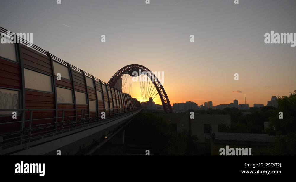 HD summer sunrise video of arched steel bridge over highway Stock Video ...
