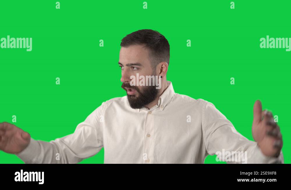 Annoyed business man making facepalm fail gesture. Portrait on green ...