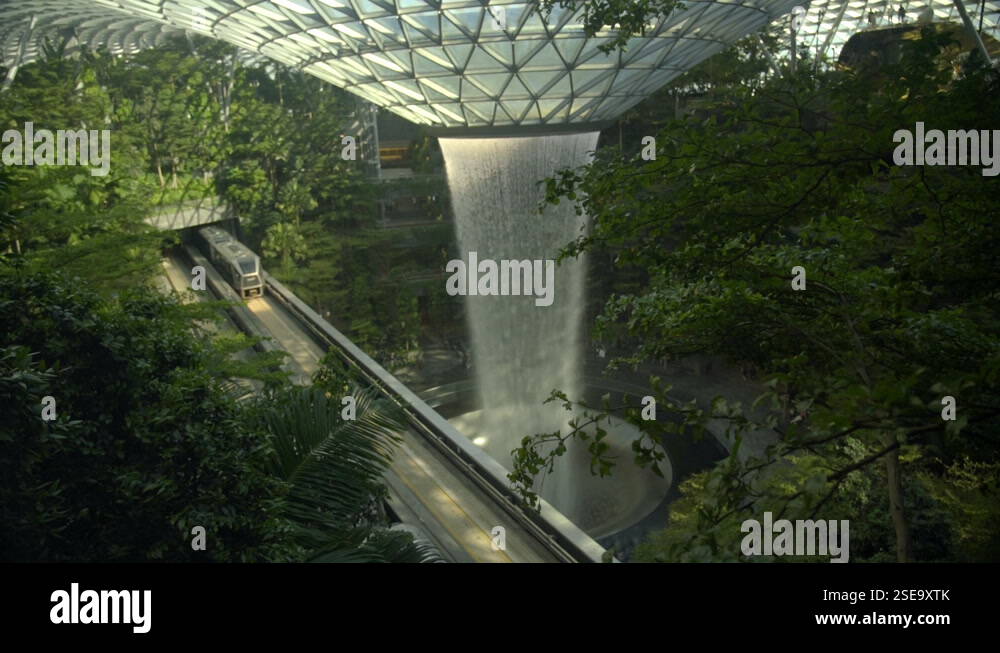 Trains in Singapore waterfall Jewel Changi Airport Stock Video Footage ...