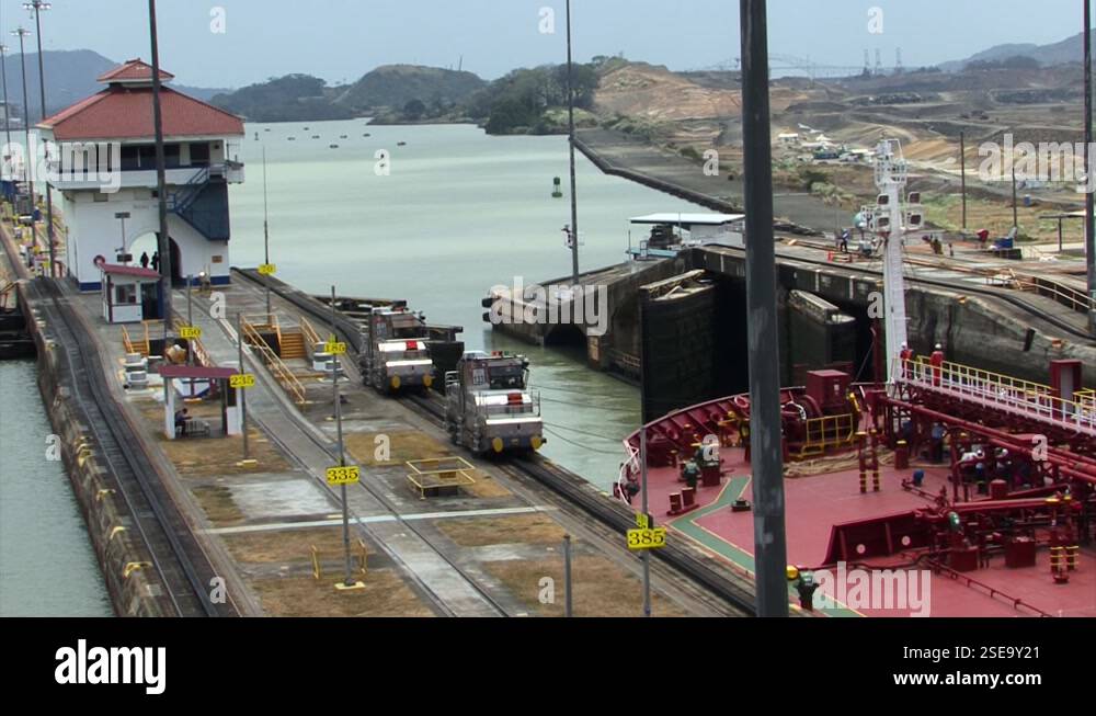Hydraulic gates of Pedro Miguel Locks being opened for the ship to pass ...