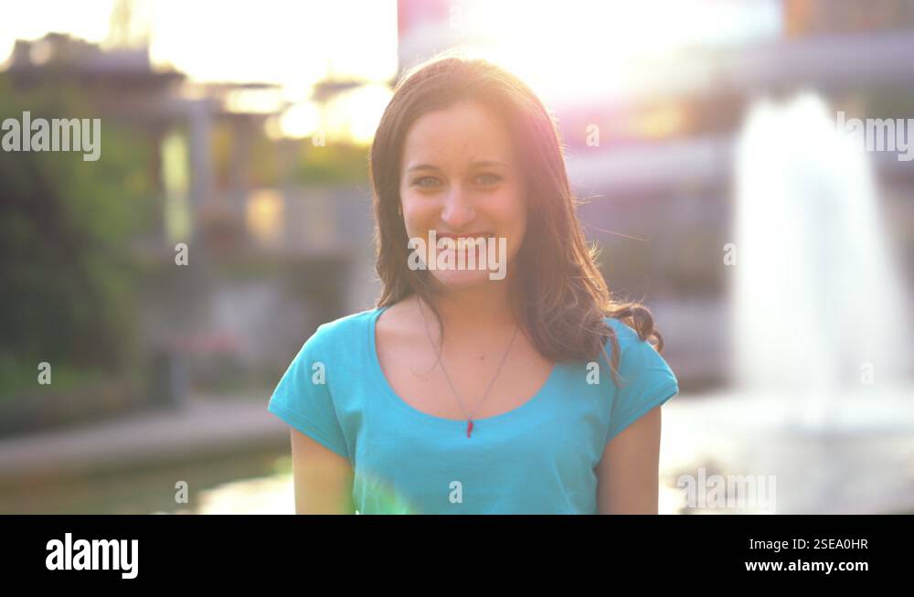 happiness, confidence - beautiful girl smiles carefree at the camera ...