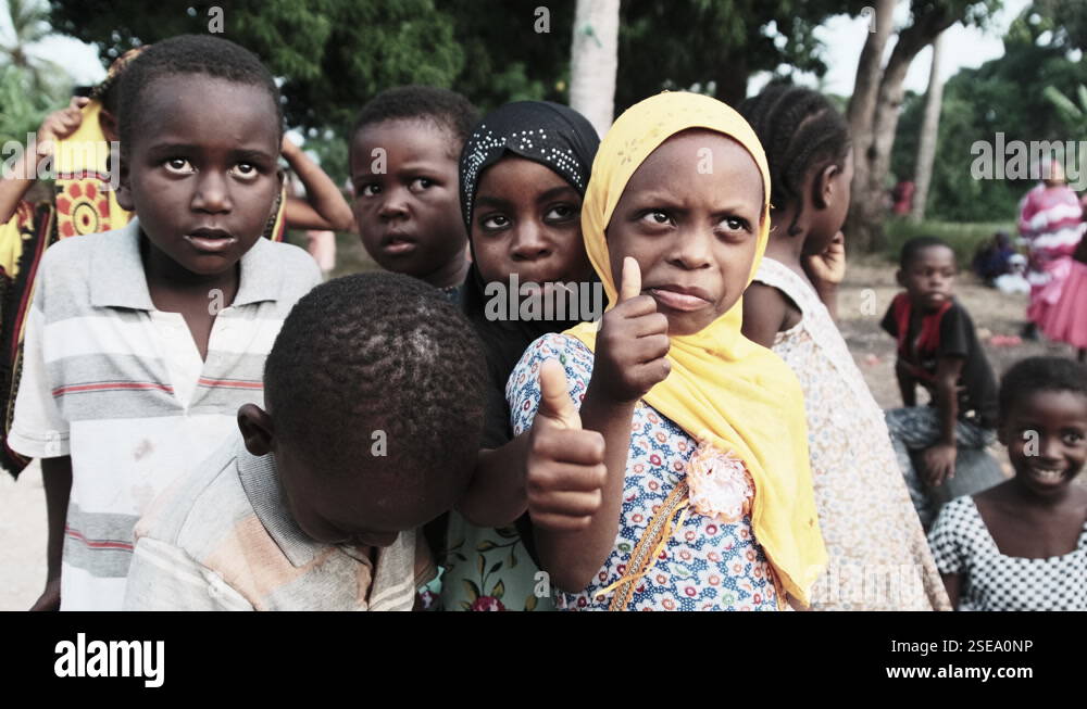 Happy Local African Kids Show Thumb-Up Sign and Curious Looking ...