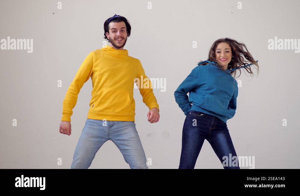 synchronized ballet - young couple performs modern dance steps Stock ...