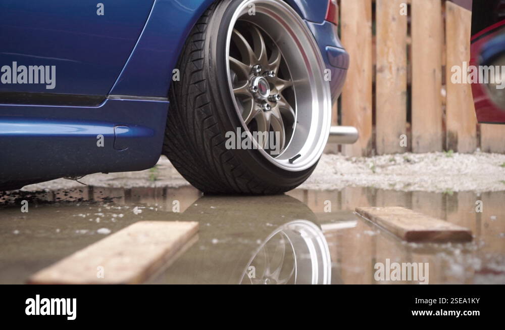 The wheel of a sports tuned car. Footage. Cast beautiful disc ...