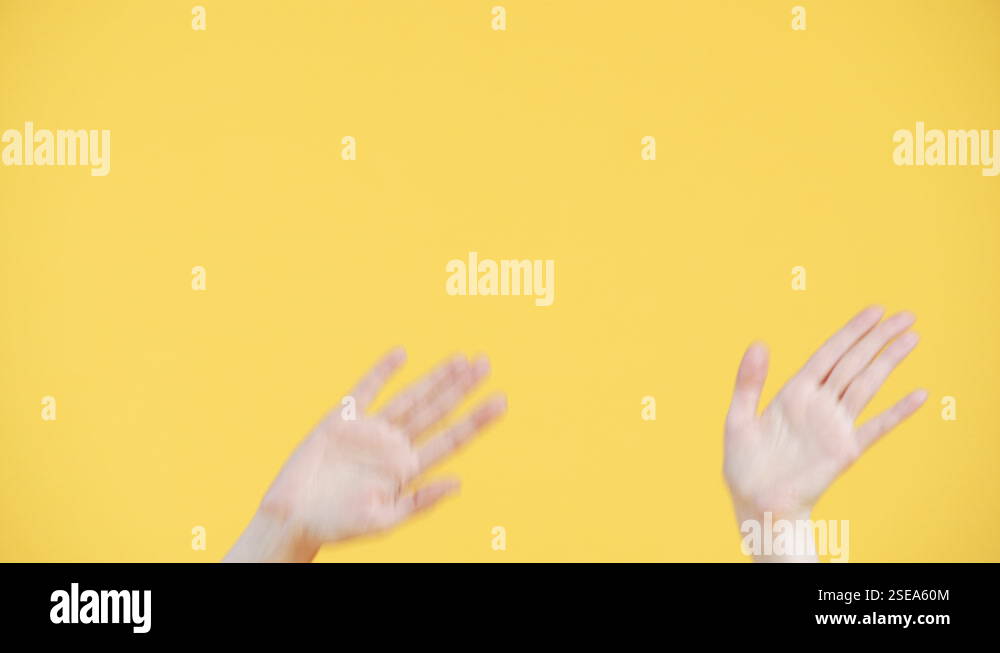 Female hands are "dancing": waving palms and pointing fingers up ...