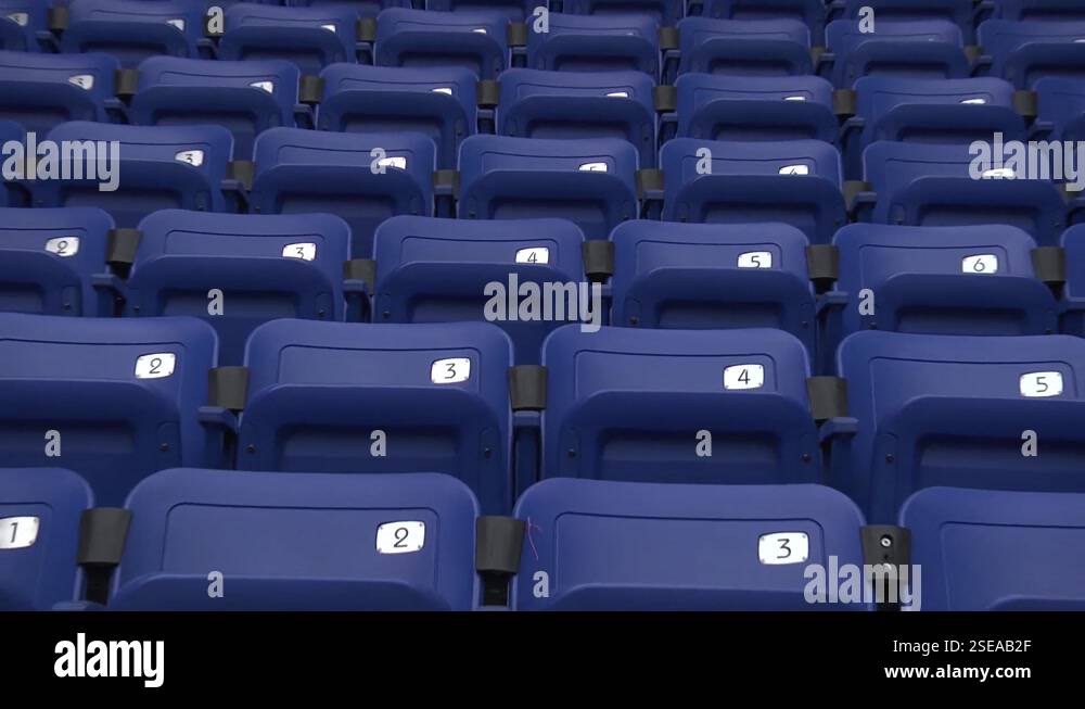 empty stadium stands with blue seats Stock Video Footage - Alamy