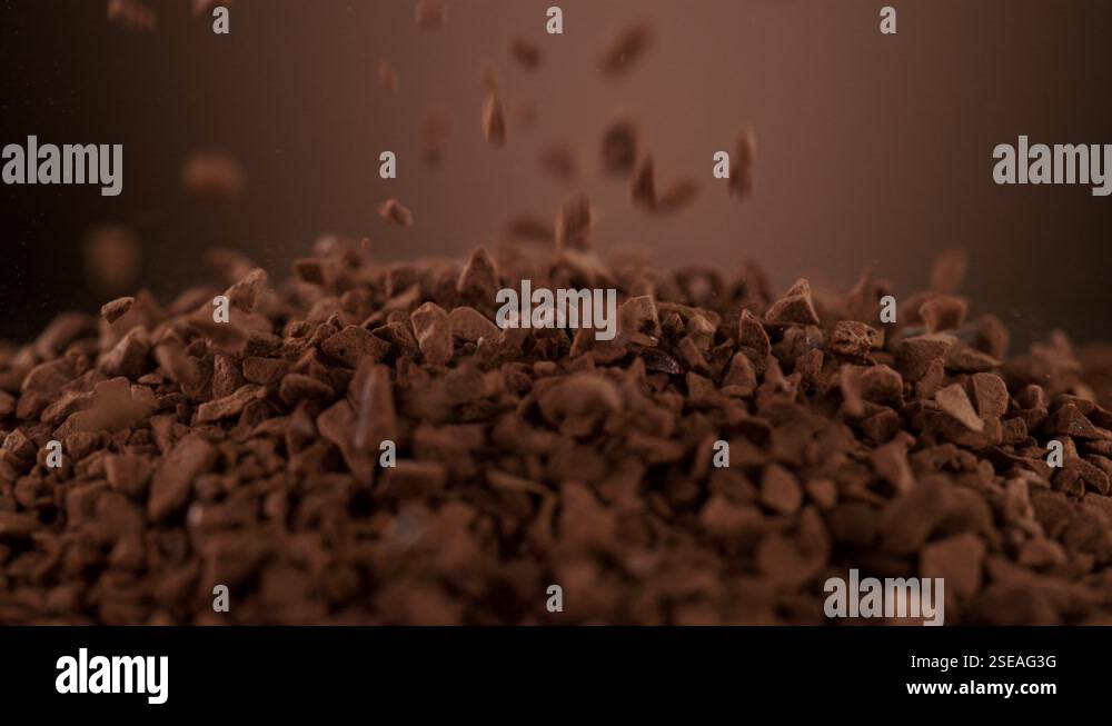 Super slow motion of pouring instant coffee on pile Stock Video Footage ...