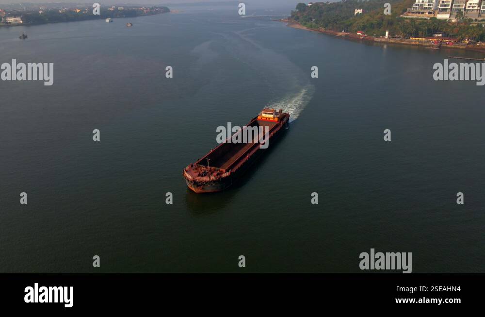 Sand cargoes sand ship crossing mandvi river goa india panji drone ...