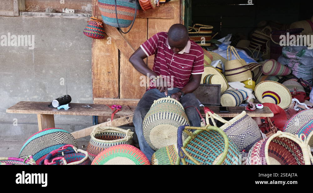 Man basket weaver making grass baskets northern Ghana Africa 4K Stock ...